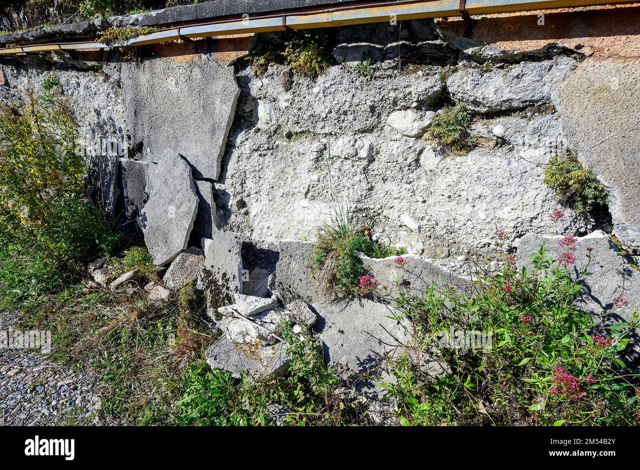Crumbling stone wall, fallen plaster, Weitnau, Allgaeu, Bavaria ...