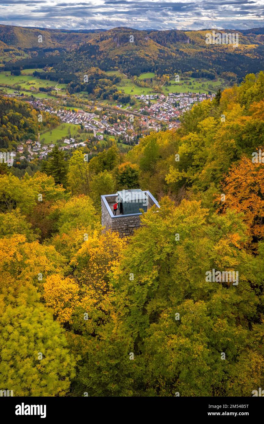 Man in red on tower in autumn forest, Swabian Alb, Germany Stock Photo ...