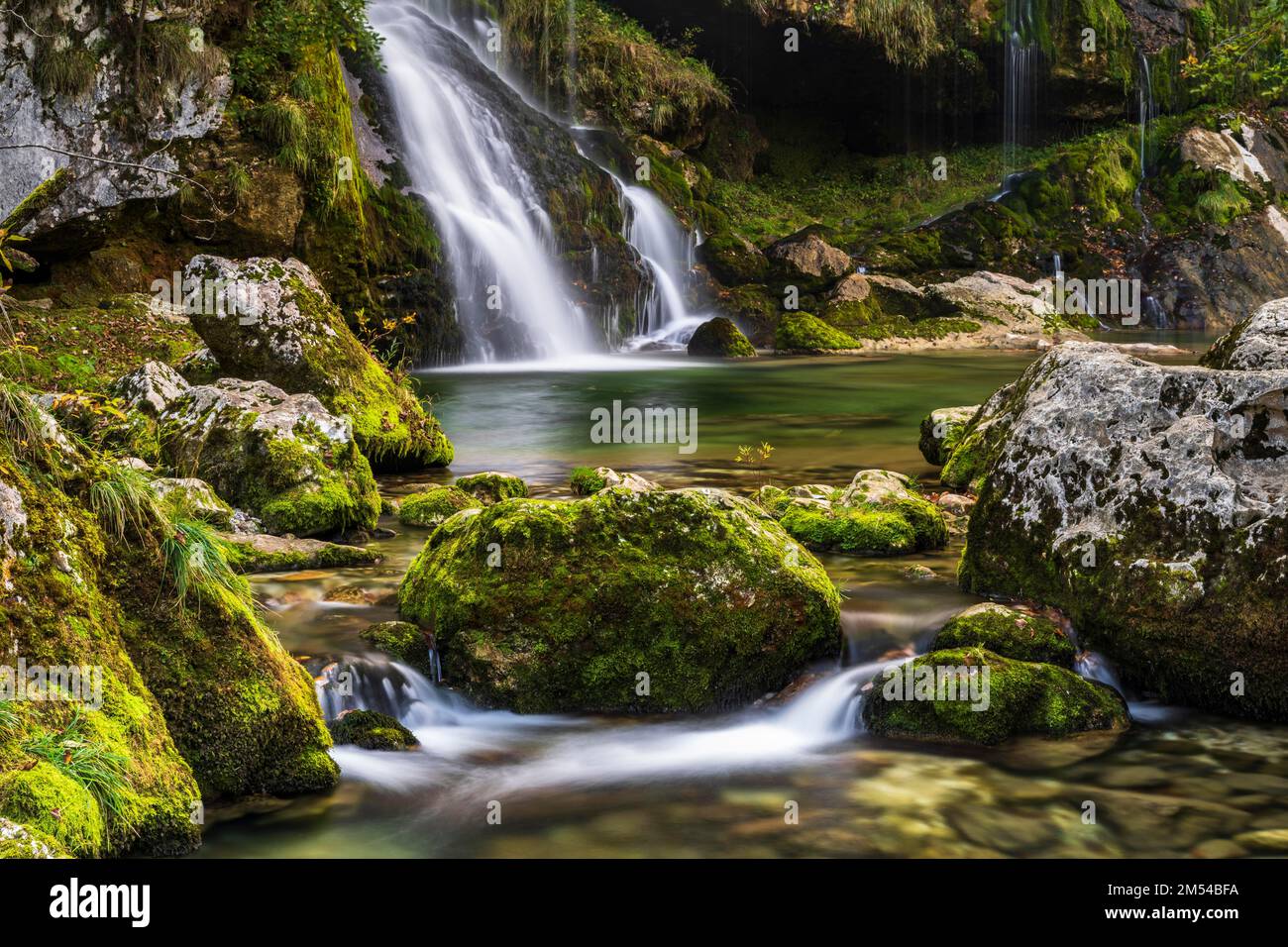 Slap Virje waterfall with mossy rocks, Gljun river, Soca valley, Bovec ...