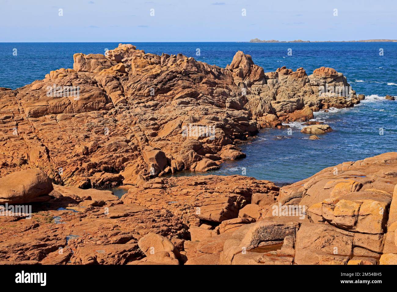 Rocks near Ploumanac'h on the Cote de granite rose, Brittany, France ...