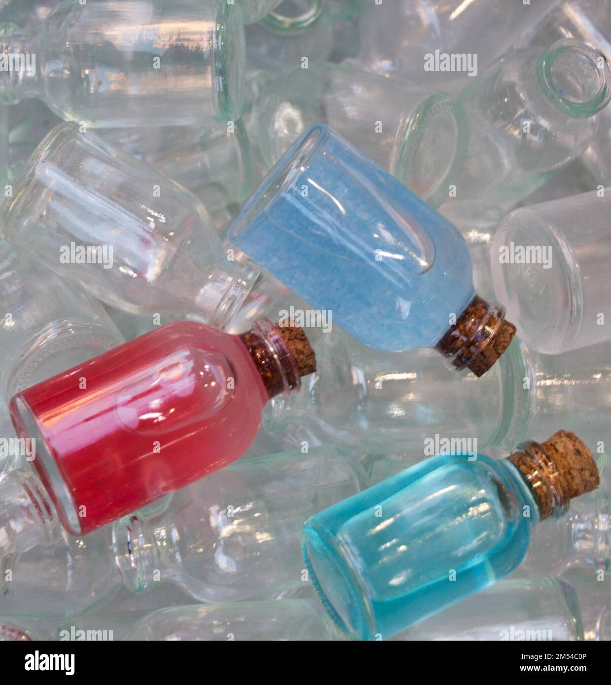 Set of Empty small transparent bottles in a box Stock Photo - Alamy