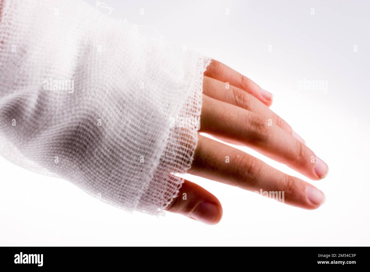 Hand wrapped in white bandage on a white background Stock Photo - Alamy