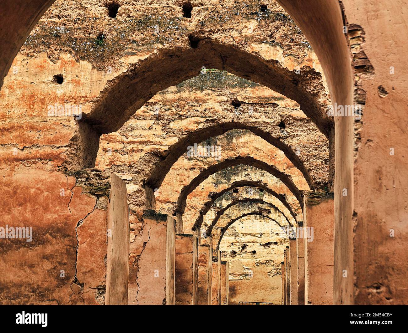 Endless rows of arches made of clay, ruins of the former royal horse ...