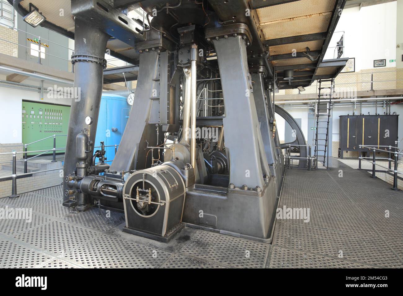 Interior view with steam engine, DEMAG pumping station in waterworks ...