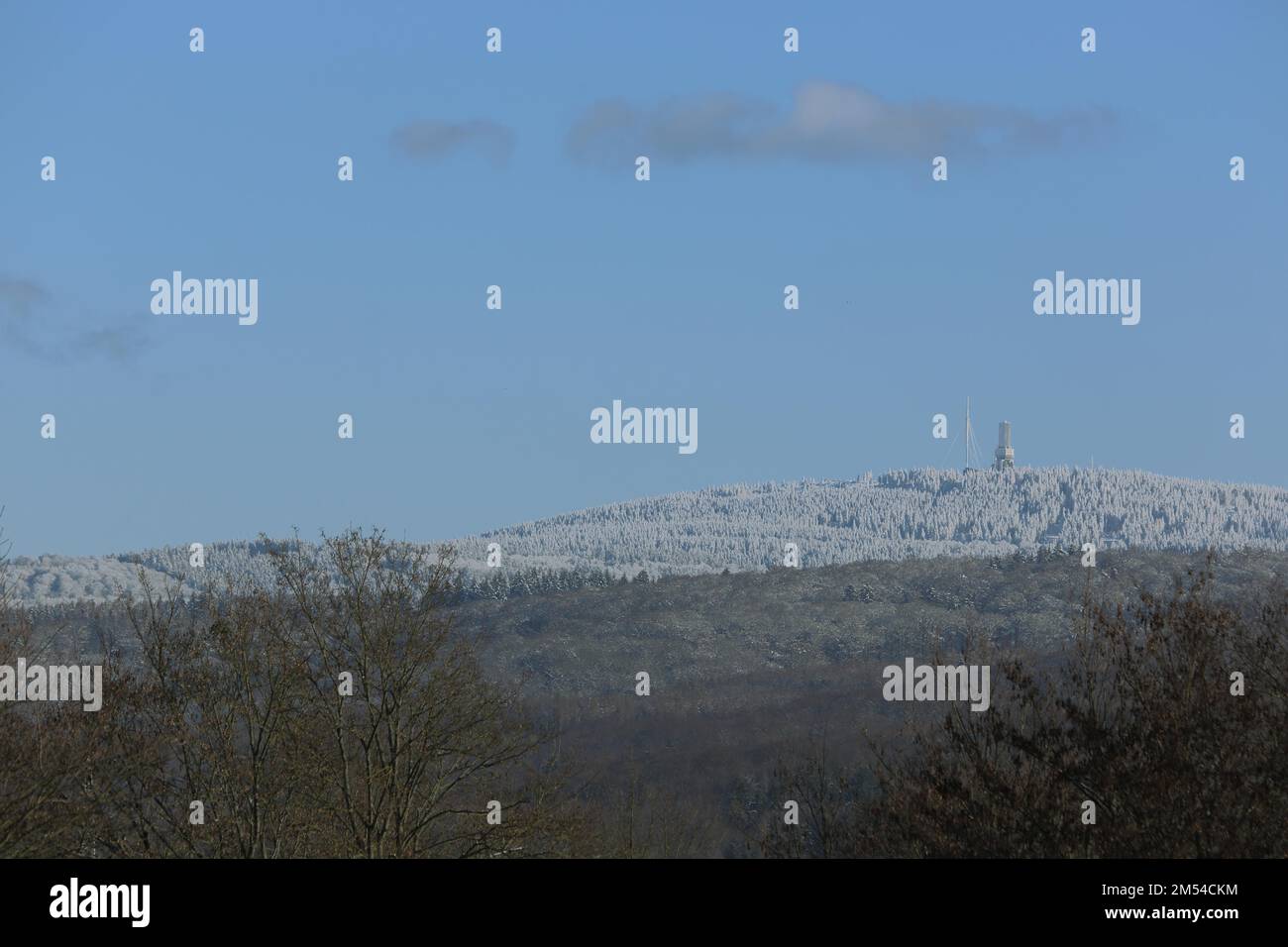 View of Grosser Feldberg with transmission tower in winter, snow ...
