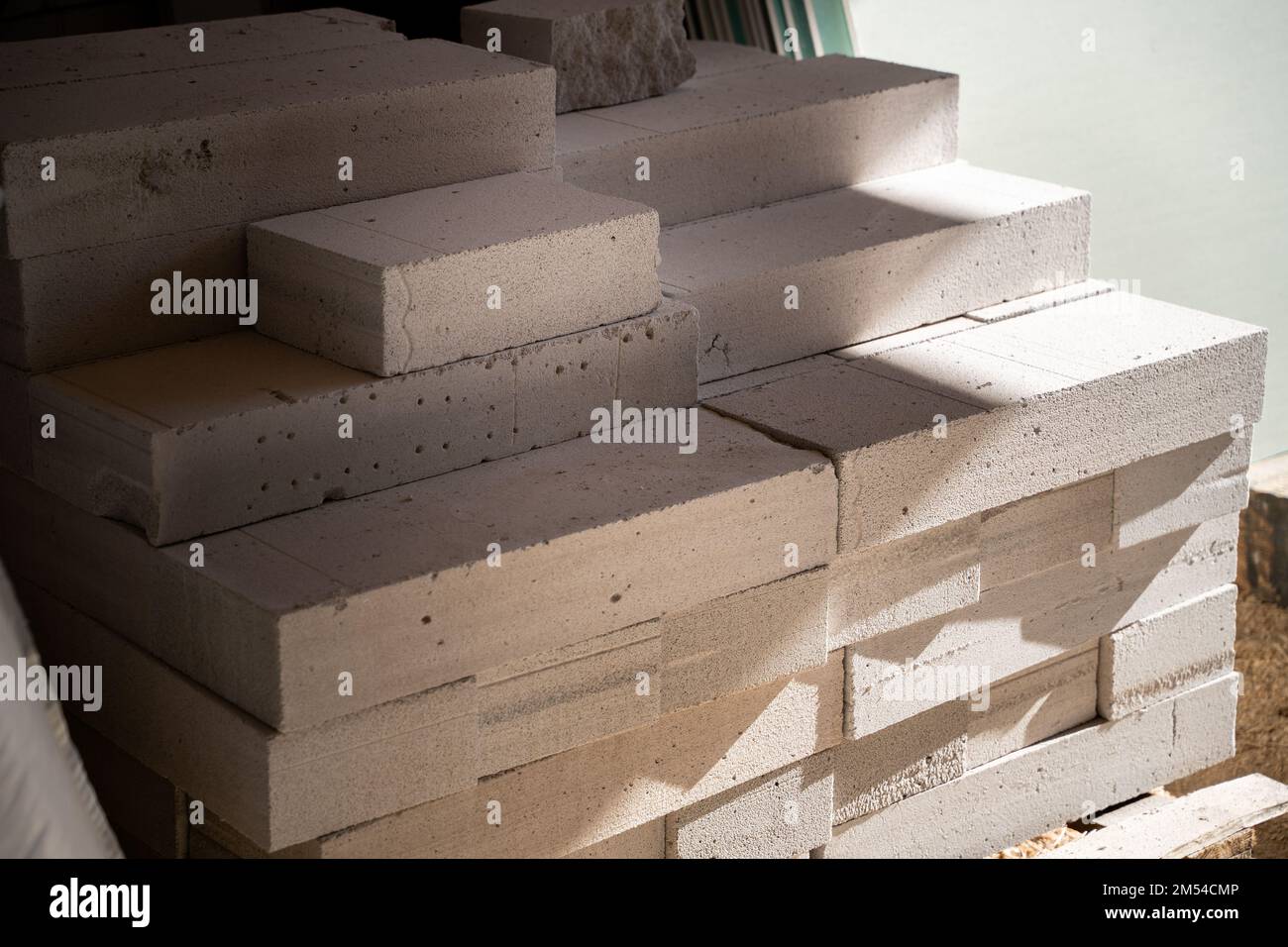 Aerated concrete bricks delivered to the construction site. Universal ...