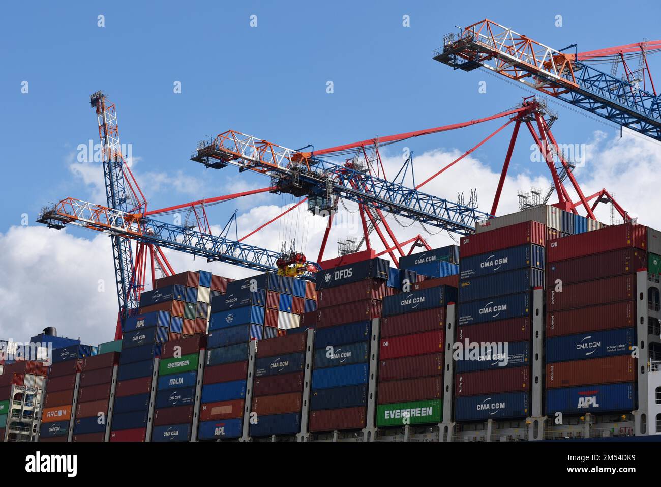 Container ship being loaded in the container port of Hamburg, Germany ...