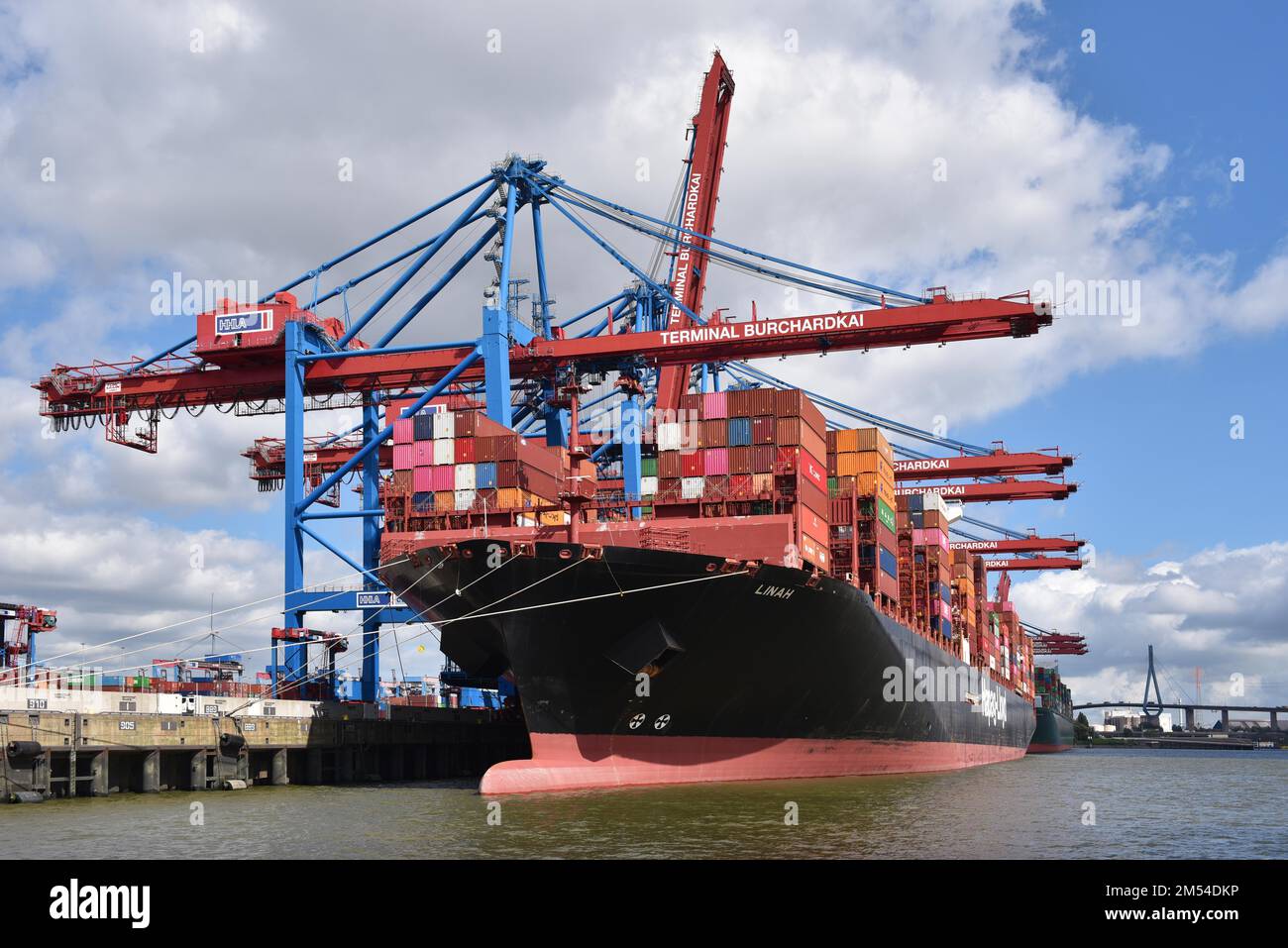 Container ship being loaded in the container port of Hamburg, Germany ...