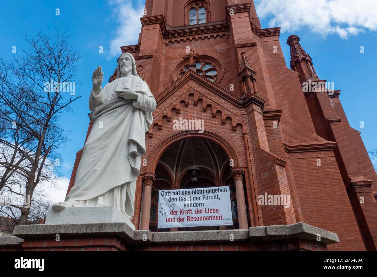 Germany, Berlin, 31. 03. 2020, Gethsemanekirche, Jesus figure, banner ...