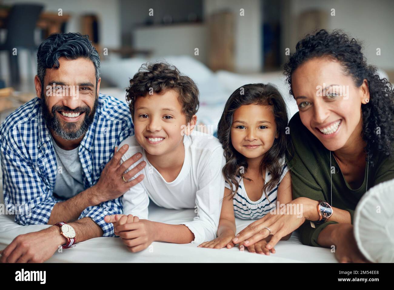 Every family shares a special bond. Portrait of a happy family bonding ...
