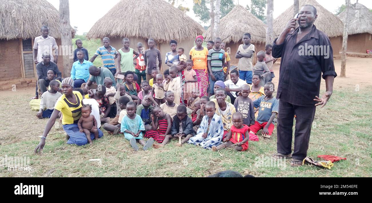 Lusaka, Uganda. 01st Dec, 2022. Musa Hasahya (right) on his farm with ...