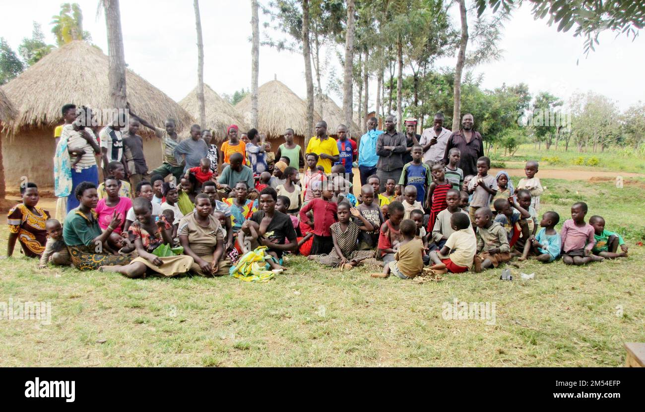 Lusaka, Uganda. 01st Dec, 2022. Musa Hasahya (back row, r) on his farm ...