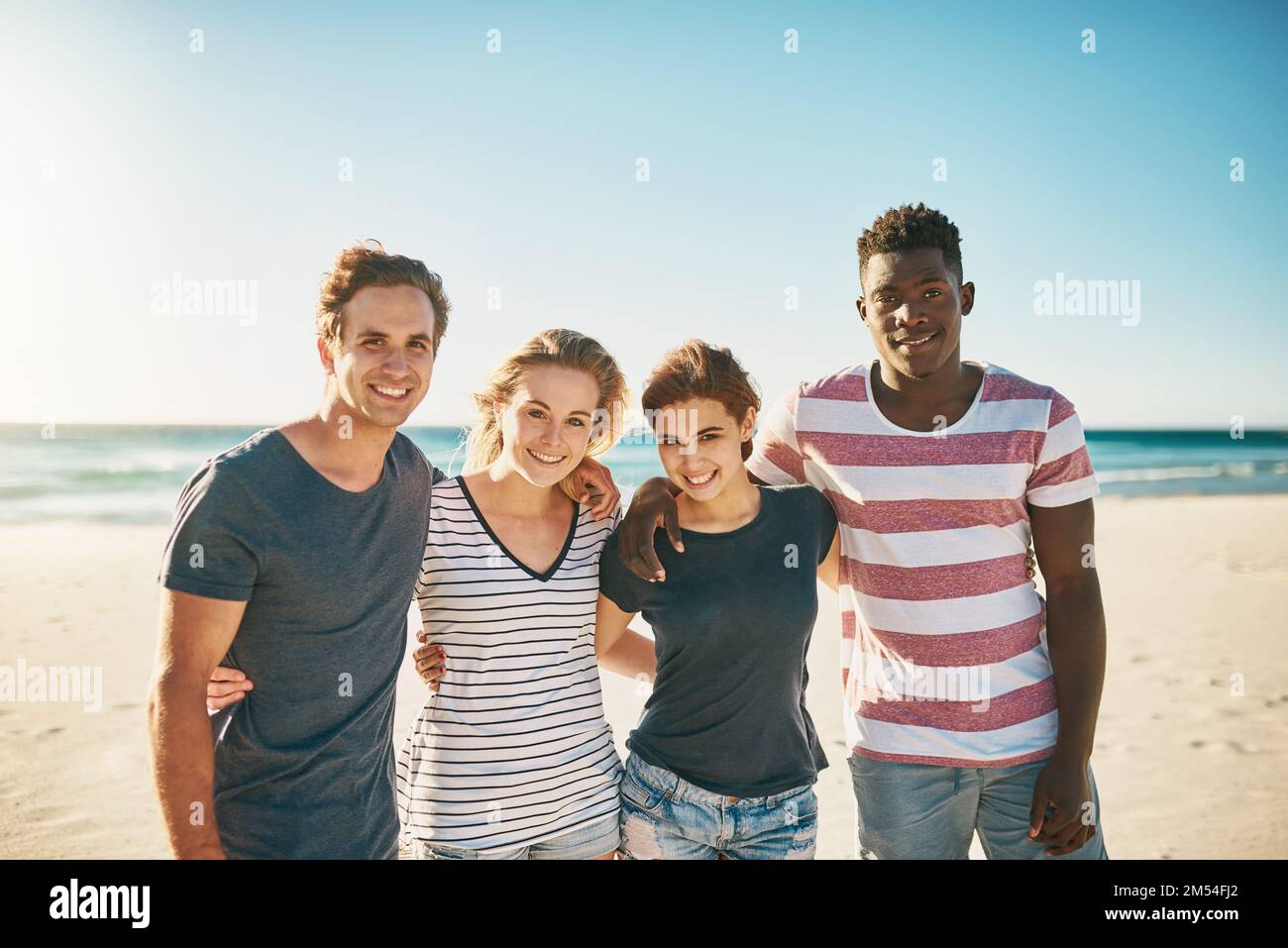 Summer vibing with awesome friends. a happy group of friends enjoying a ...