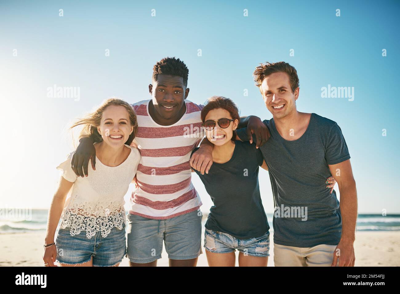 When its hot out youve gotta hit the beach. a happy group of friends ...
