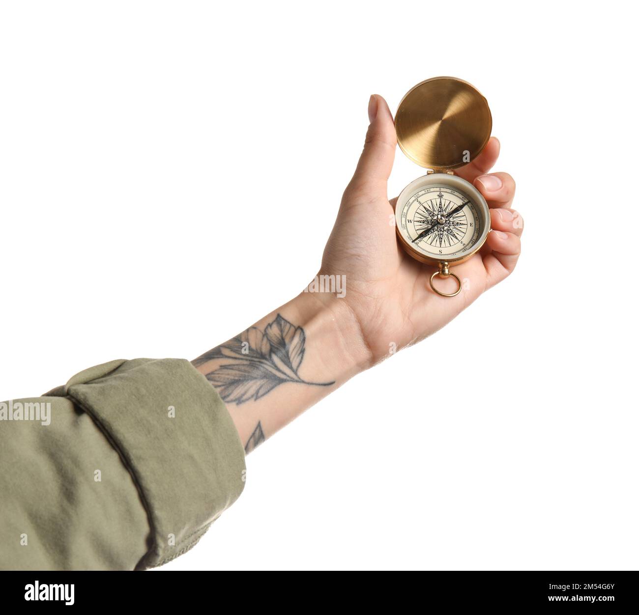 Woman with golden compass on white background Stock Photo - Alamy