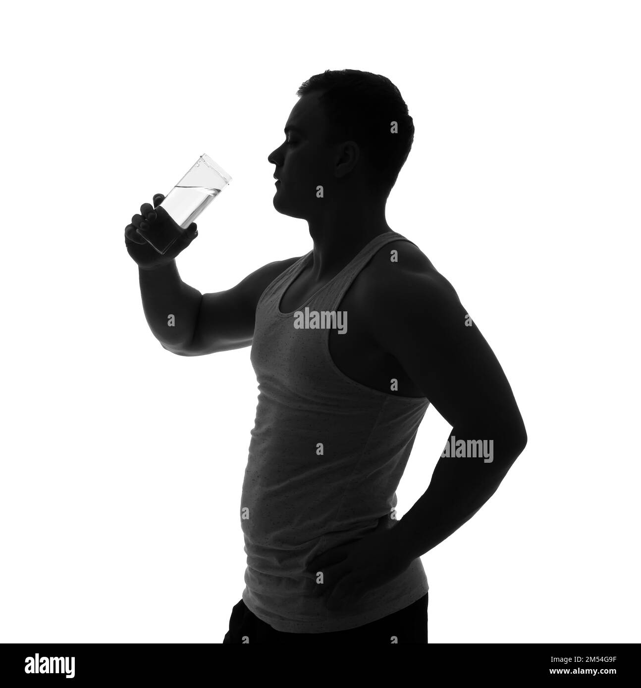 Young man glass water Black and White Stock Photos & Images - Alamy