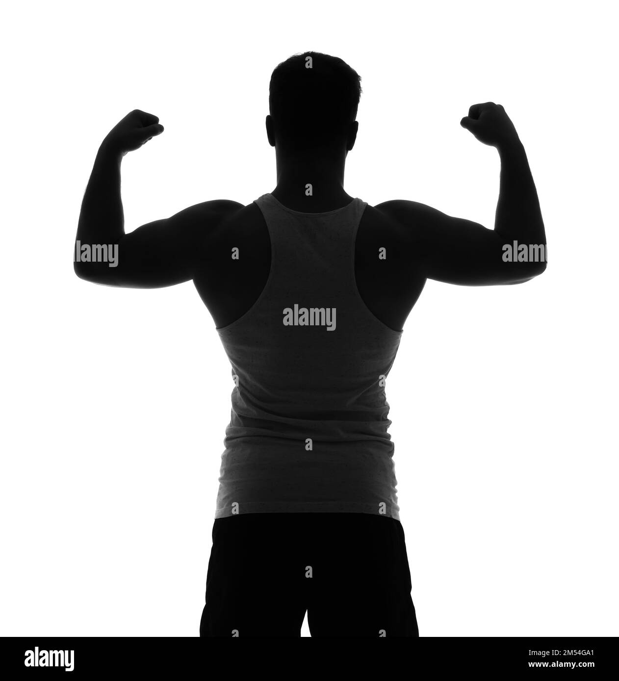 Silhouette of sporty young man showing muscles on white background ...