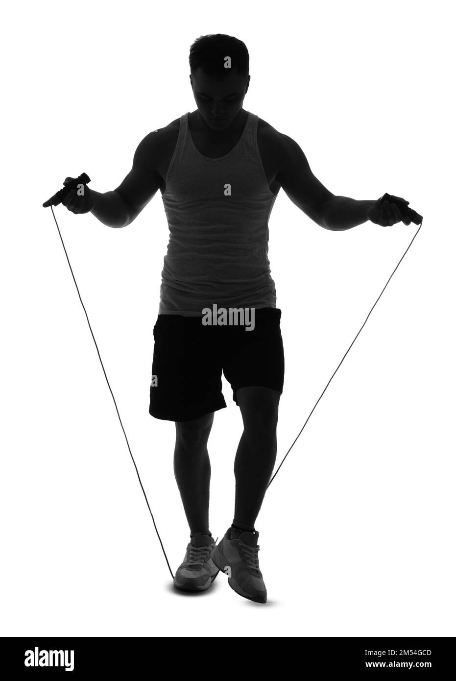 Silhouette of young man with skipping rope on white background Stock ...