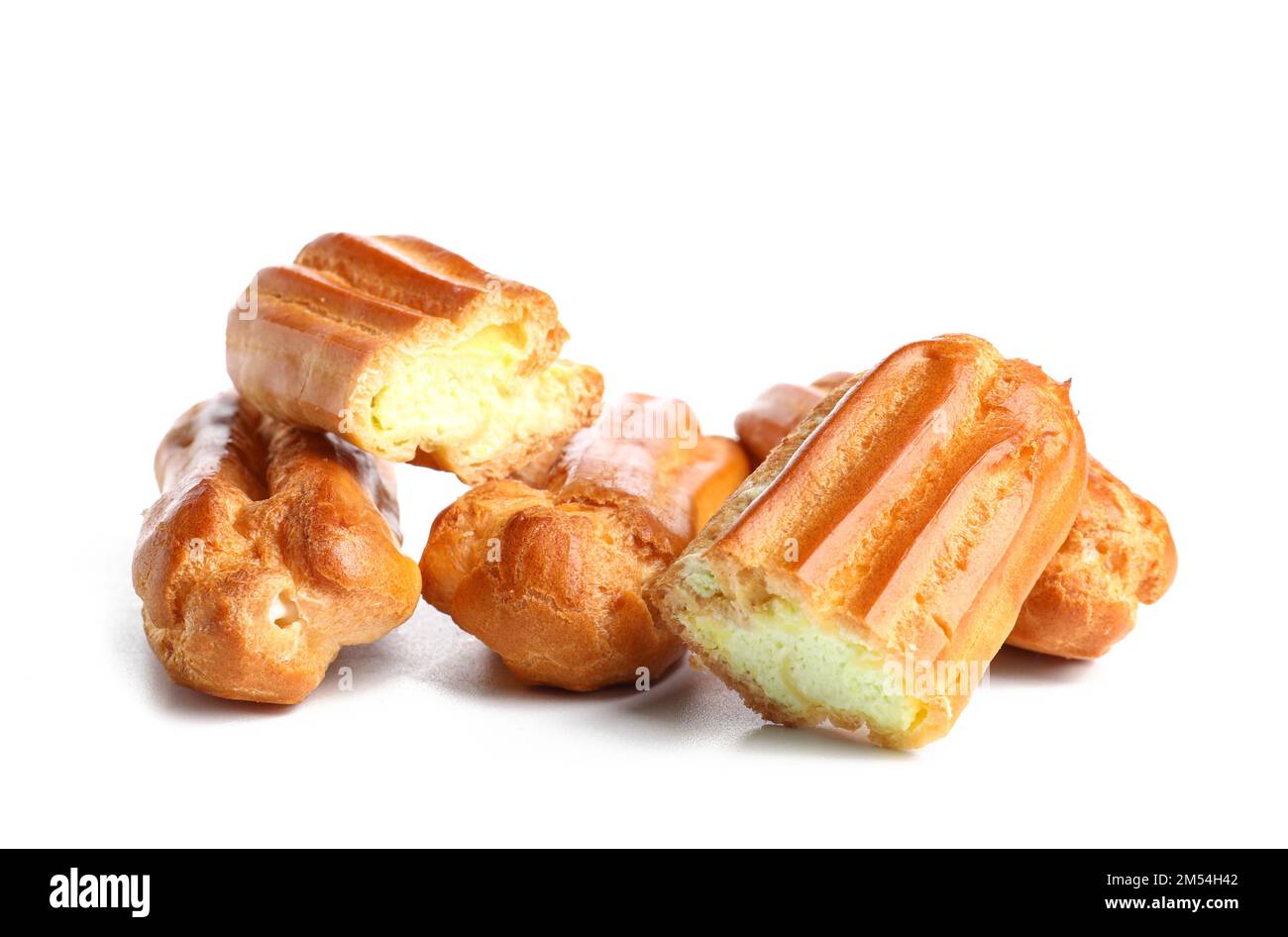 Delicious sweet eclairs isolated on white background Stock Photo - Alamy