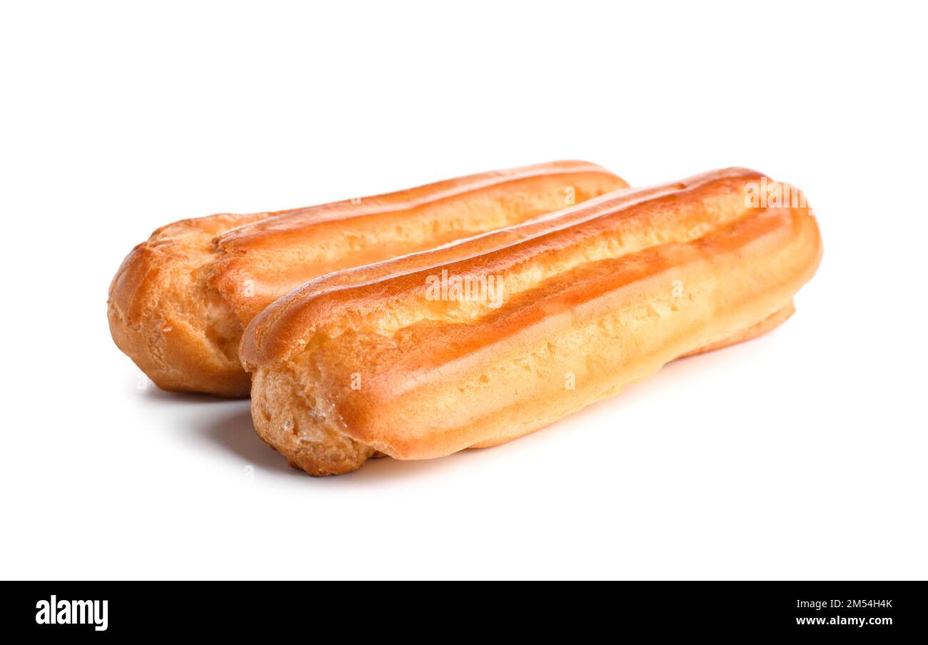 Delicious sweet eclairs isolated on white background Stock Photo - Alamy