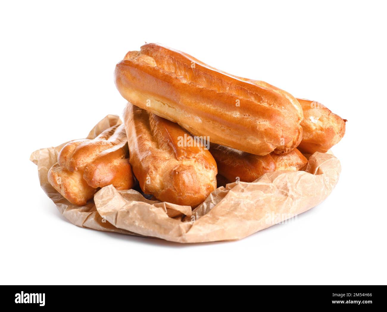 Baking paper with sweet eclairs on white background Stock Photo - Alamy