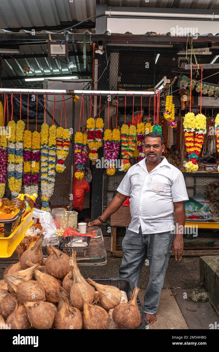 Flower seller at Temple in Kuala Lumpur Stock Photo - Alamy
