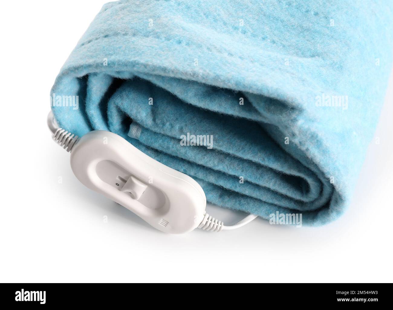 Folded electric heating pad with controller on white background Stock ...