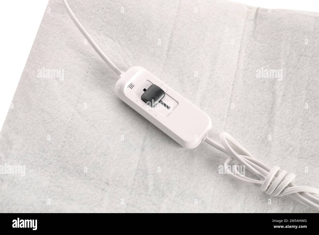 Electric heating pad with controller on white background, closeup Stock ...