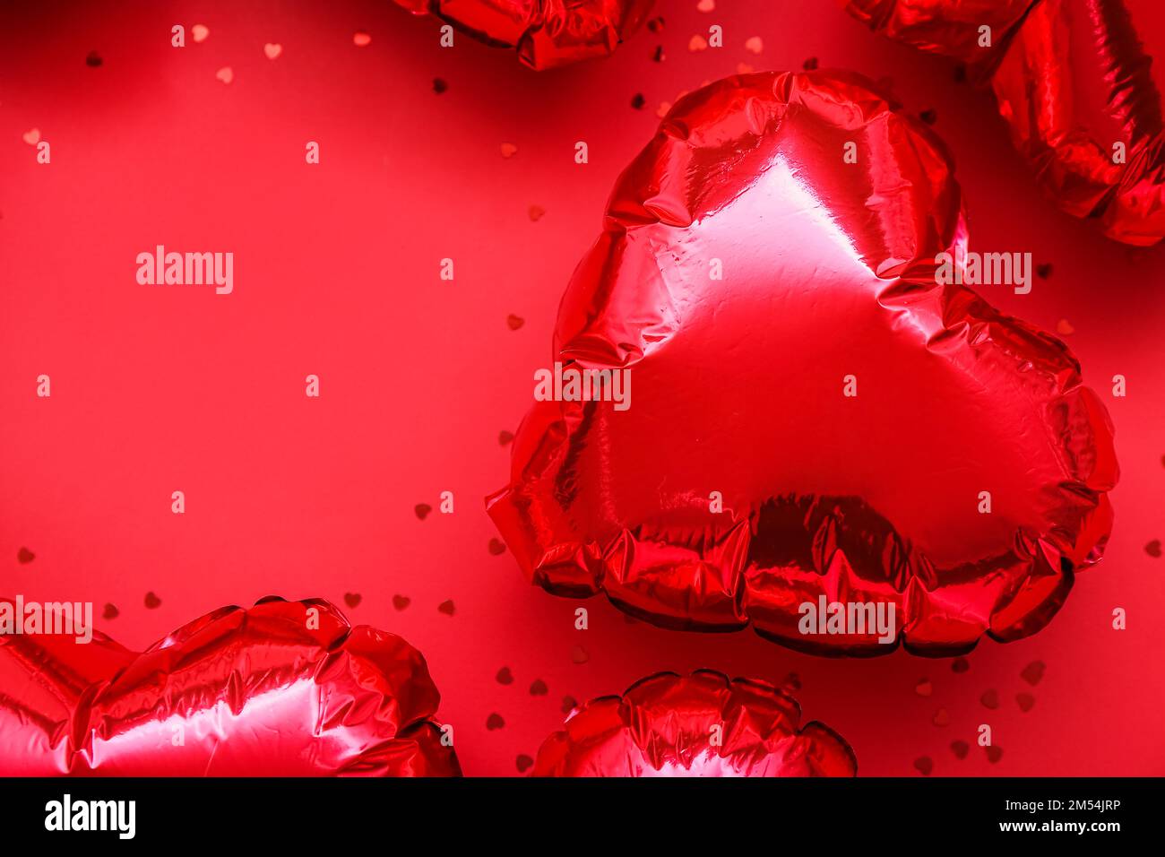 Frame made of heart-shaped balloons on red background. Valentine's Day ...