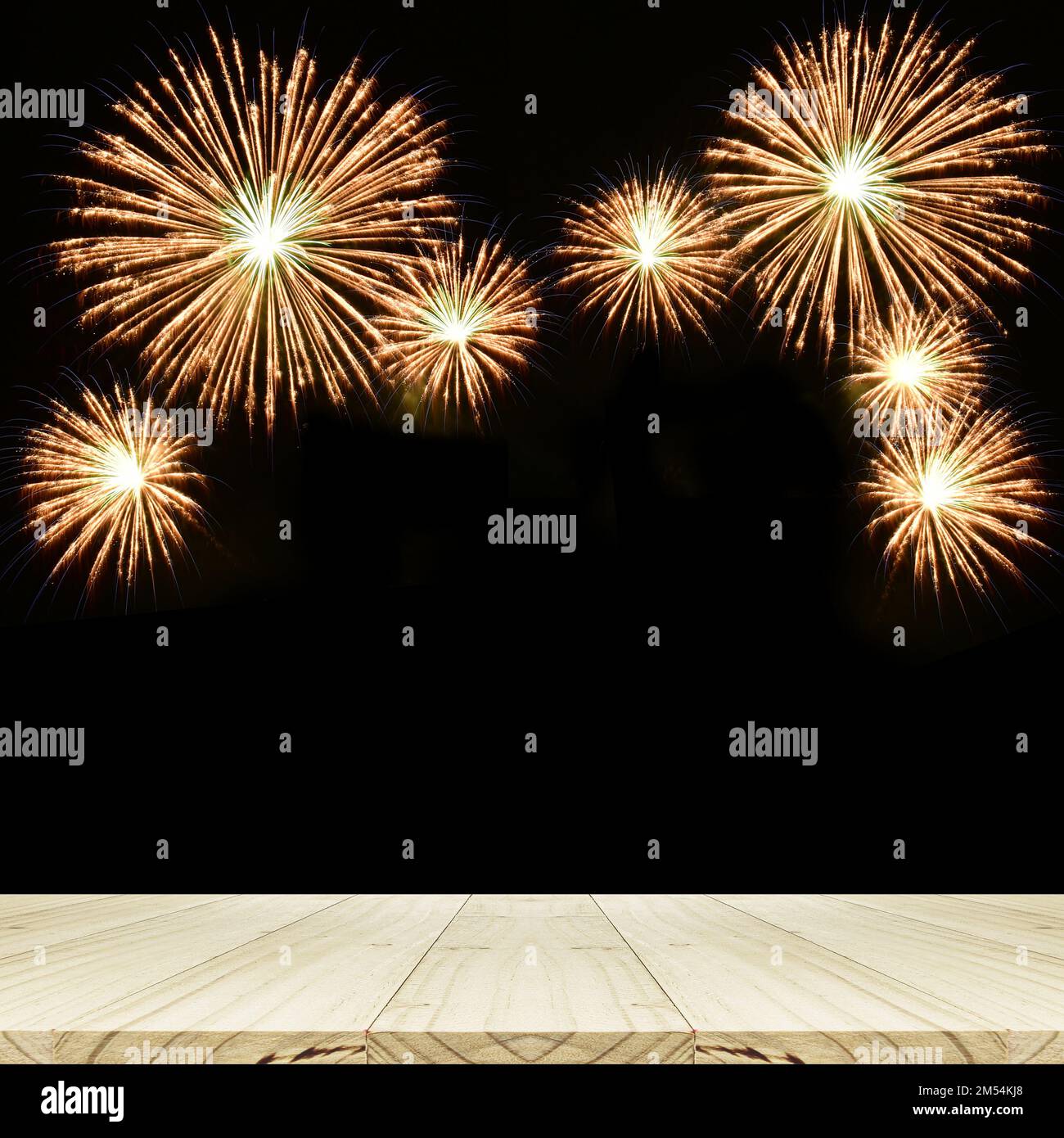 Background of wood table with fireworks backdrop for products display ...