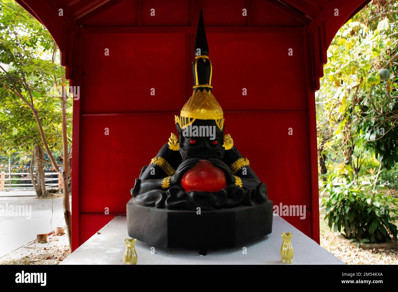 Ancient rahu titan deity demon lunar eclipse statue in antique ruin ...