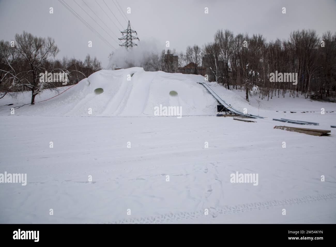 Workers were building an ice and snow park to prepare for the upcoming ...