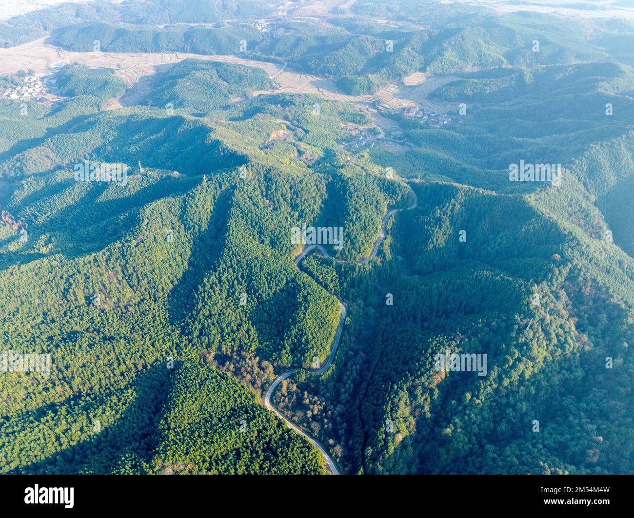 Aerial photo shows a winding mountain road in Jinjia Village, Huangtong ...