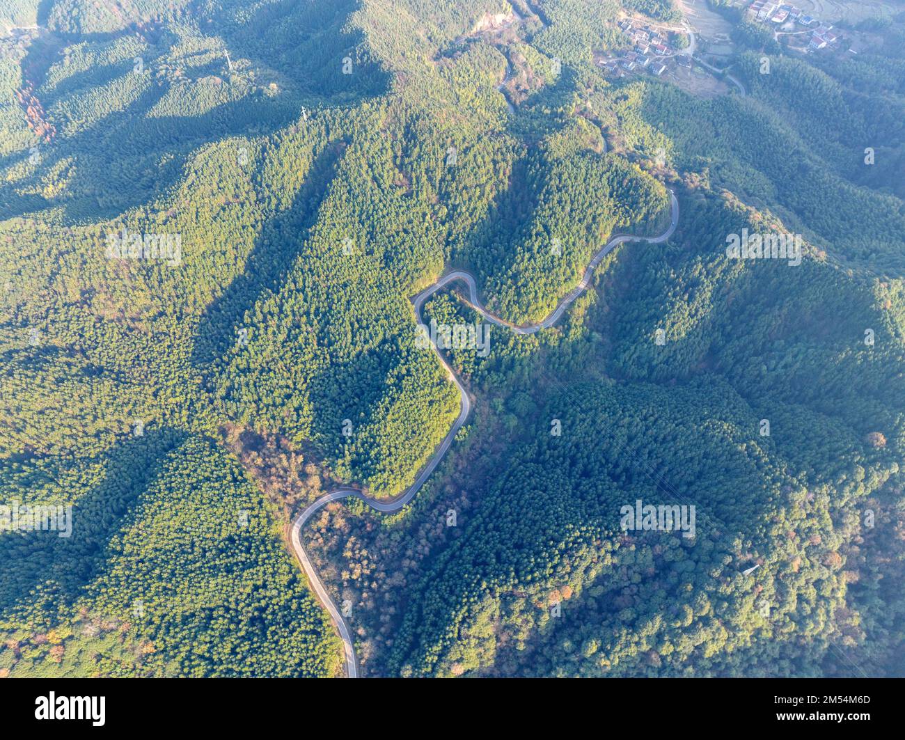 Aerial photo shows a winding mountain road in Jinjia Village, Huangtong ...
