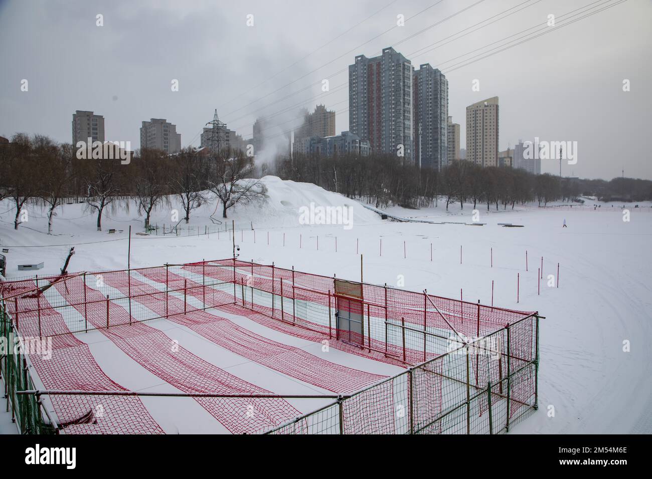 Workers were building an ice and snow park to prepare for the upcoming ...