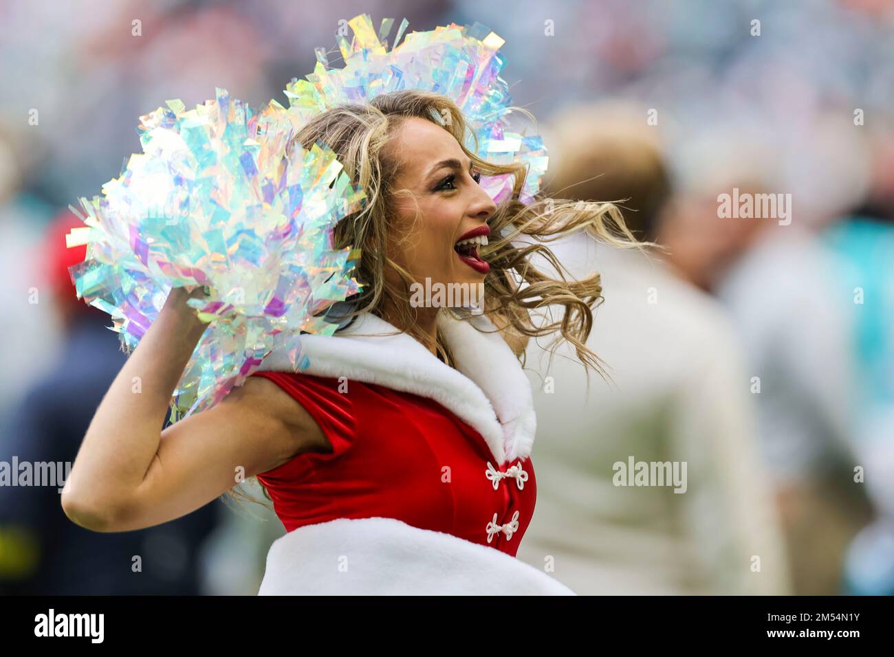 Miami. FL USA; Miami Dolphins cheerleaders wore festive red Christmas ...