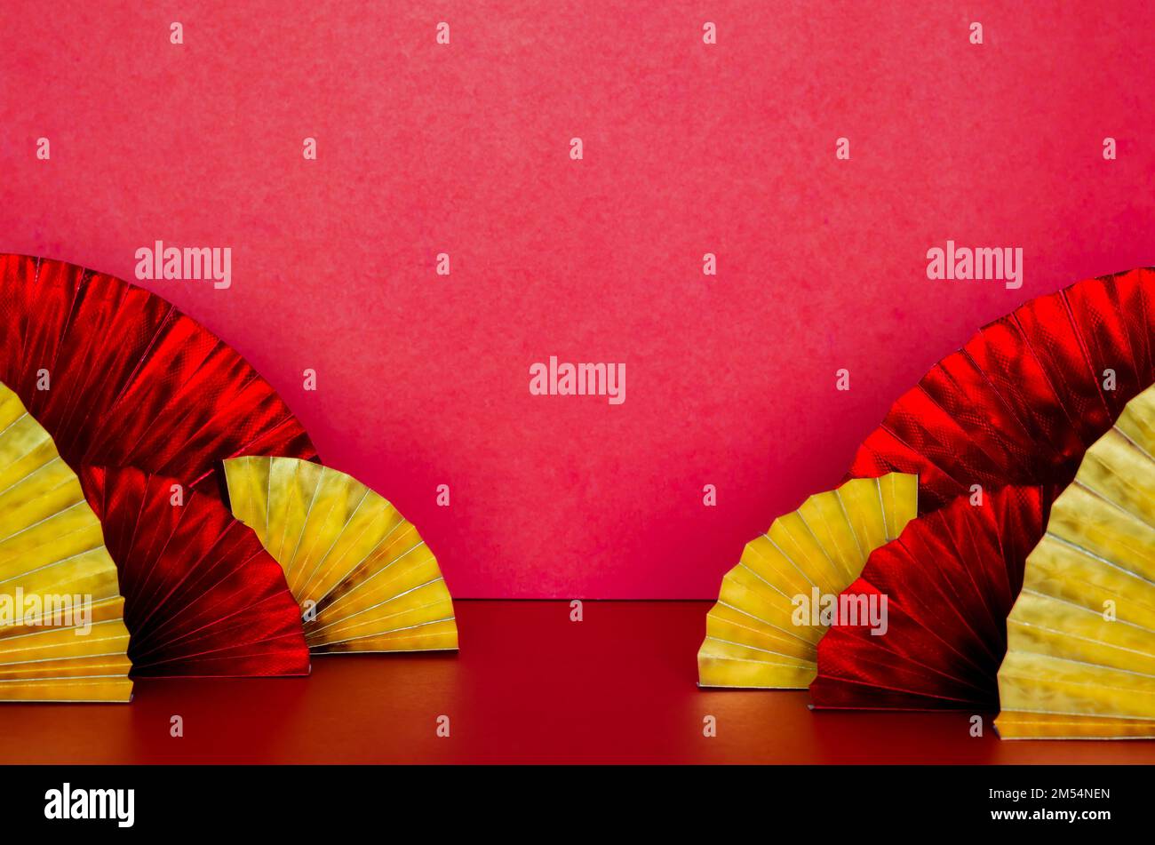 Selective focus on some golden and red oriental fans with red ...
