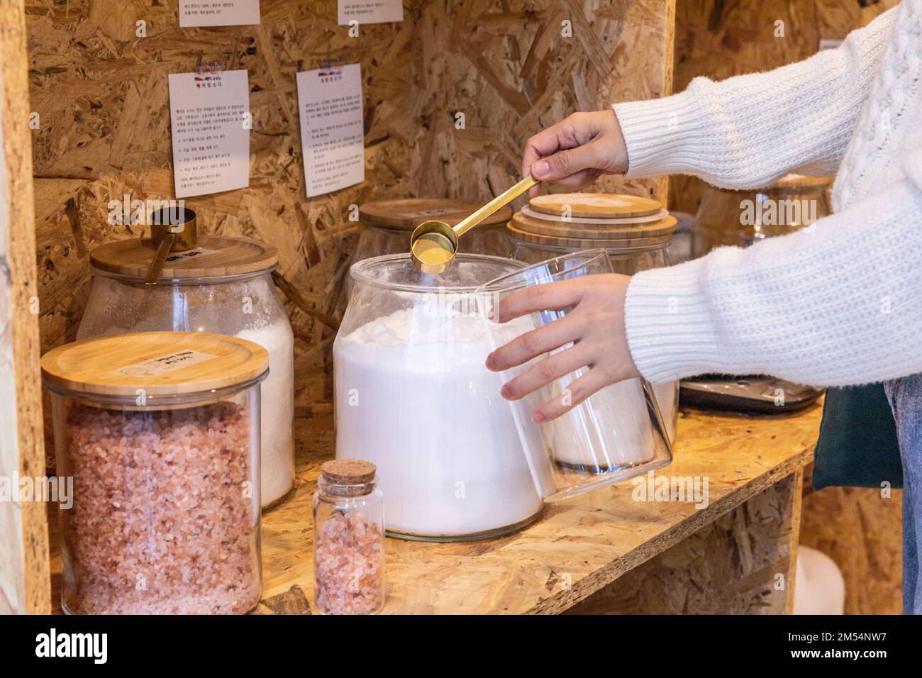 eco friendly habits hand gesture refilling hands with powder detergent ...