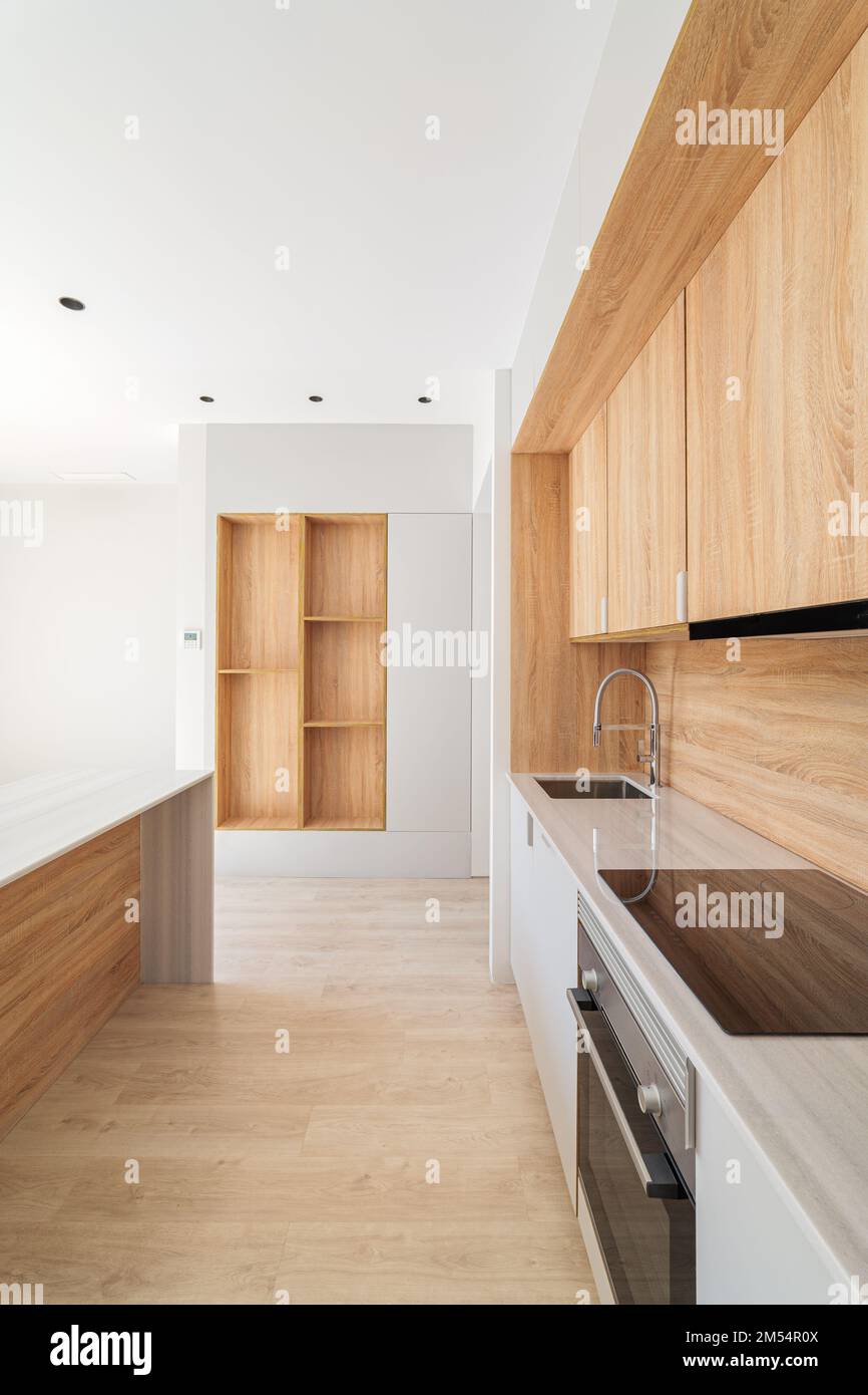 Hob and oven in kitchen island hi-res stock photography and images - Alamy