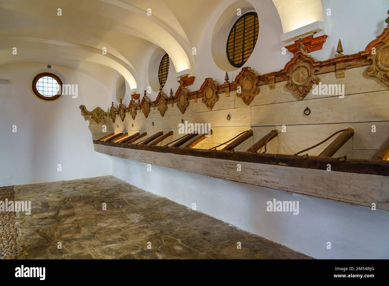 Ancient medieval stables for horses with typical Andalusian decoration ...
