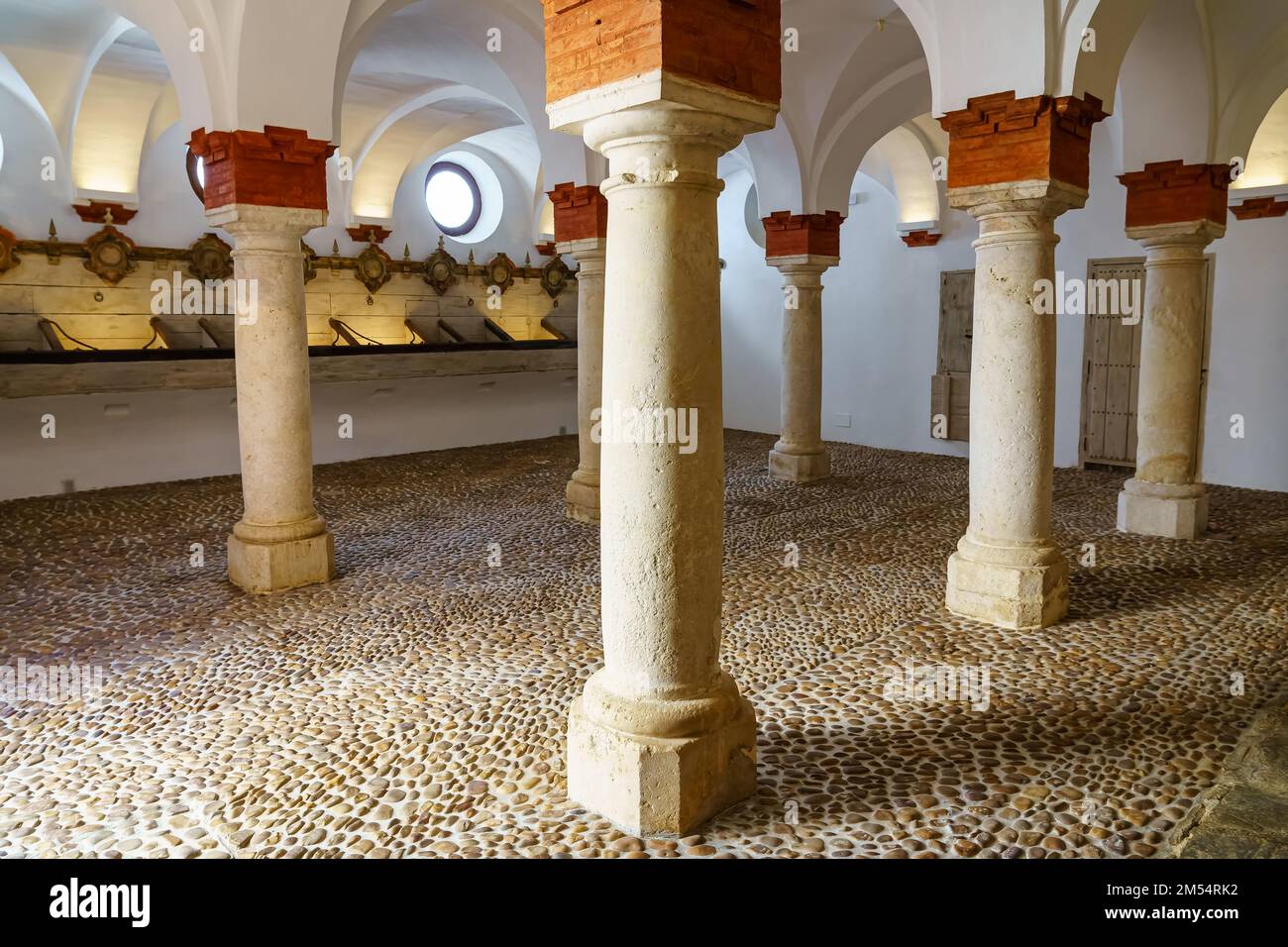 Ancient medieval stables for horses with typical Andalusian decoration ...