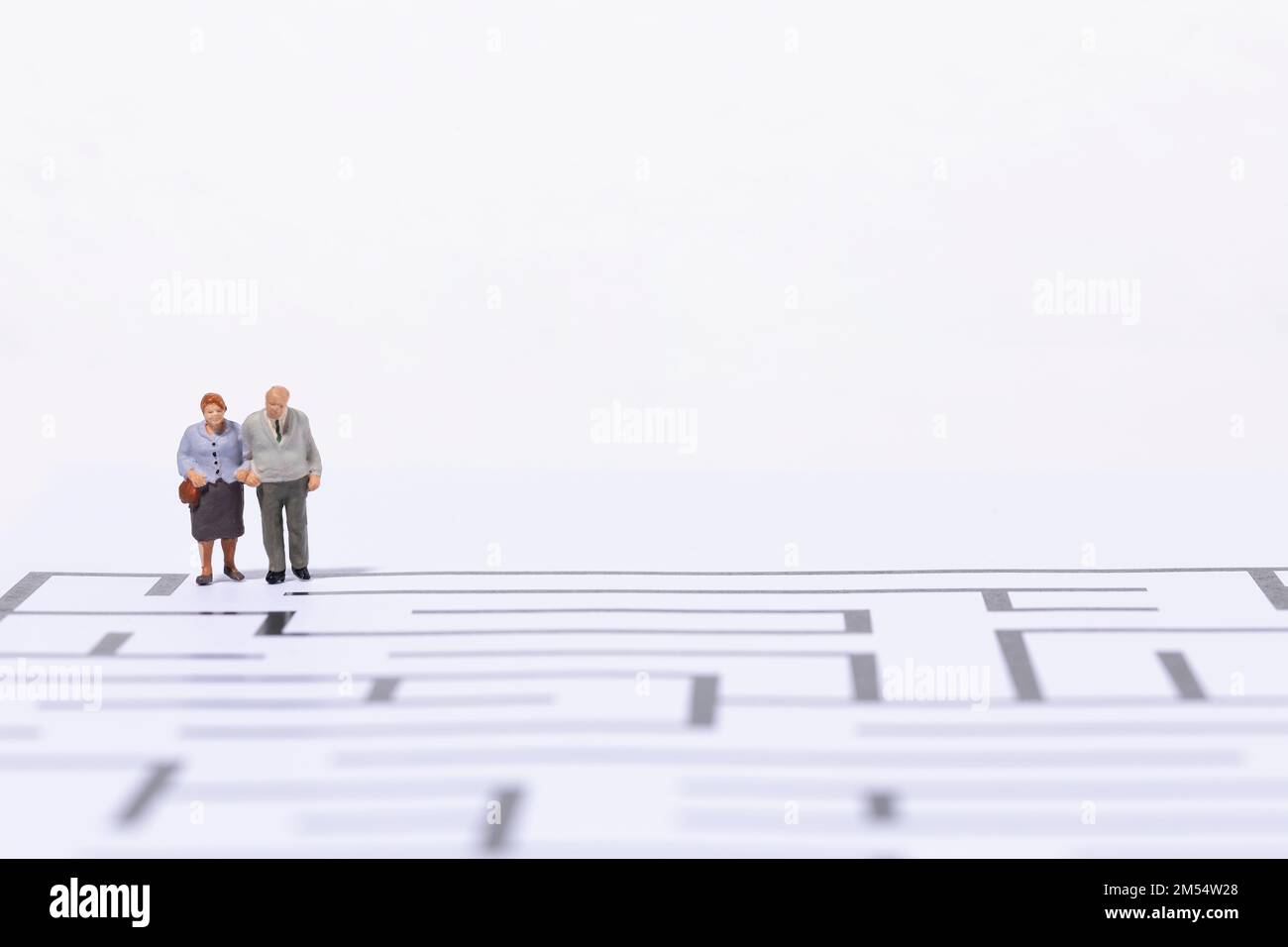 brain health and dementia series a miniature of the old man standing in ...