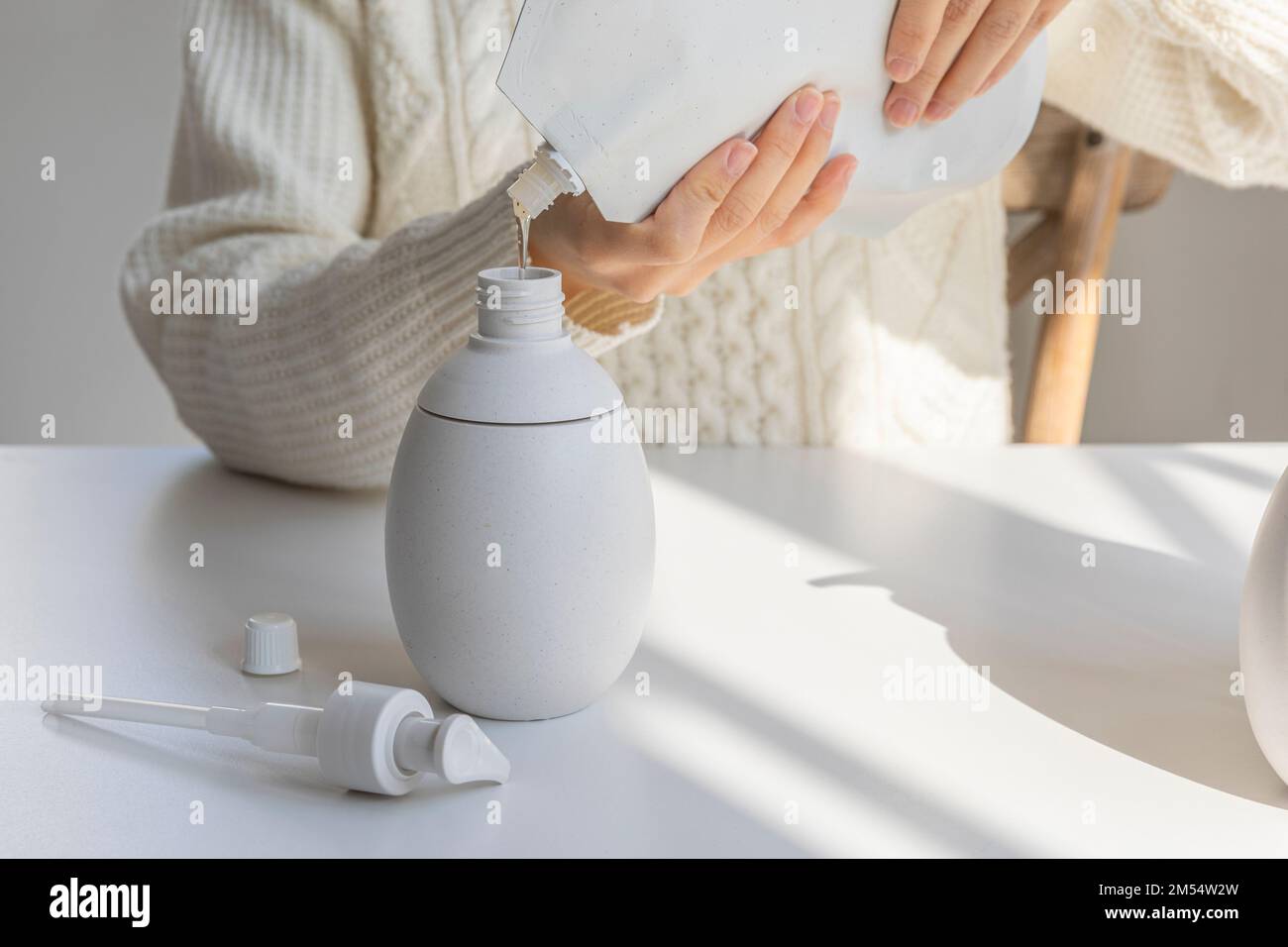eco friendly habits hand gesture using refill containers Stock Photo ...