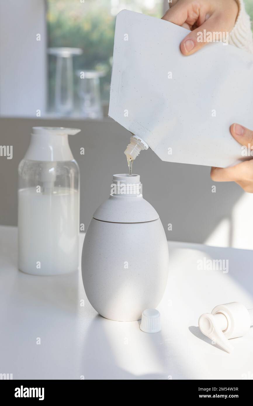 eco friendly habits hand gesture using refill containers Stock Photo ...