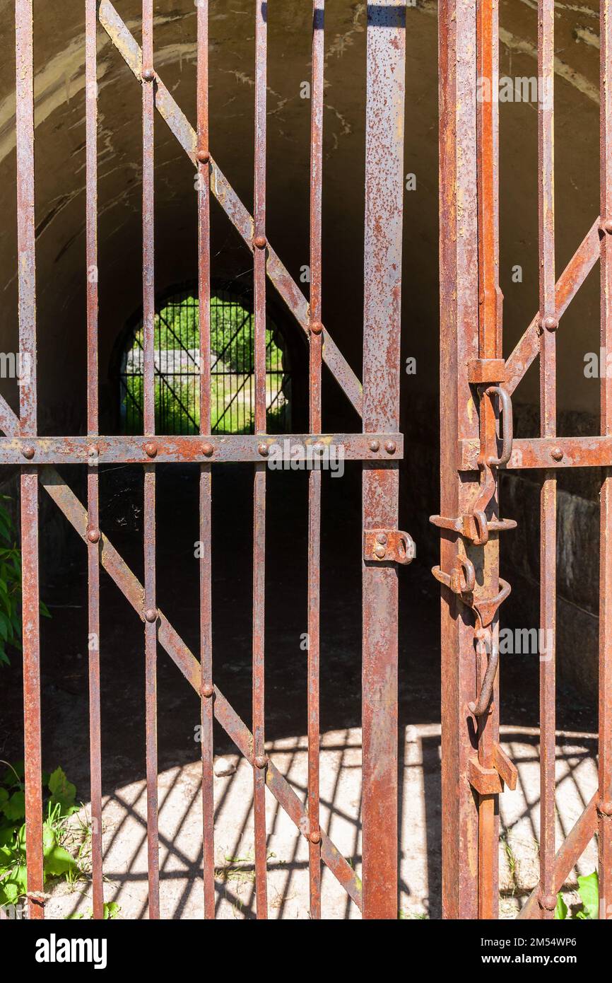 Old rusty iron gate to a tunnel Stock Photo - Alamy