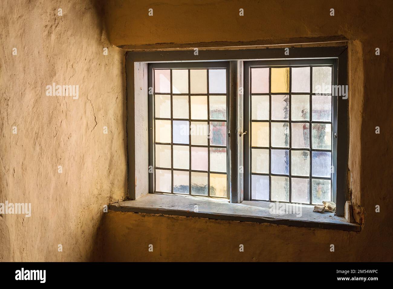 Old stained glass windows in a castle Stock Photo - Alamy