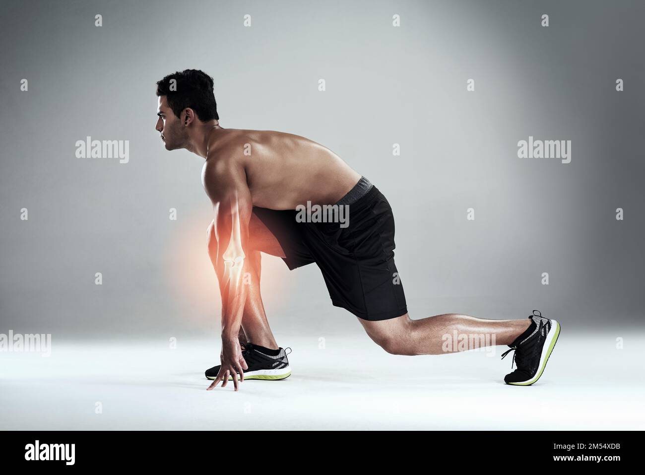 Pushing his body to the absolute limit. a sporty young man on his mark ...