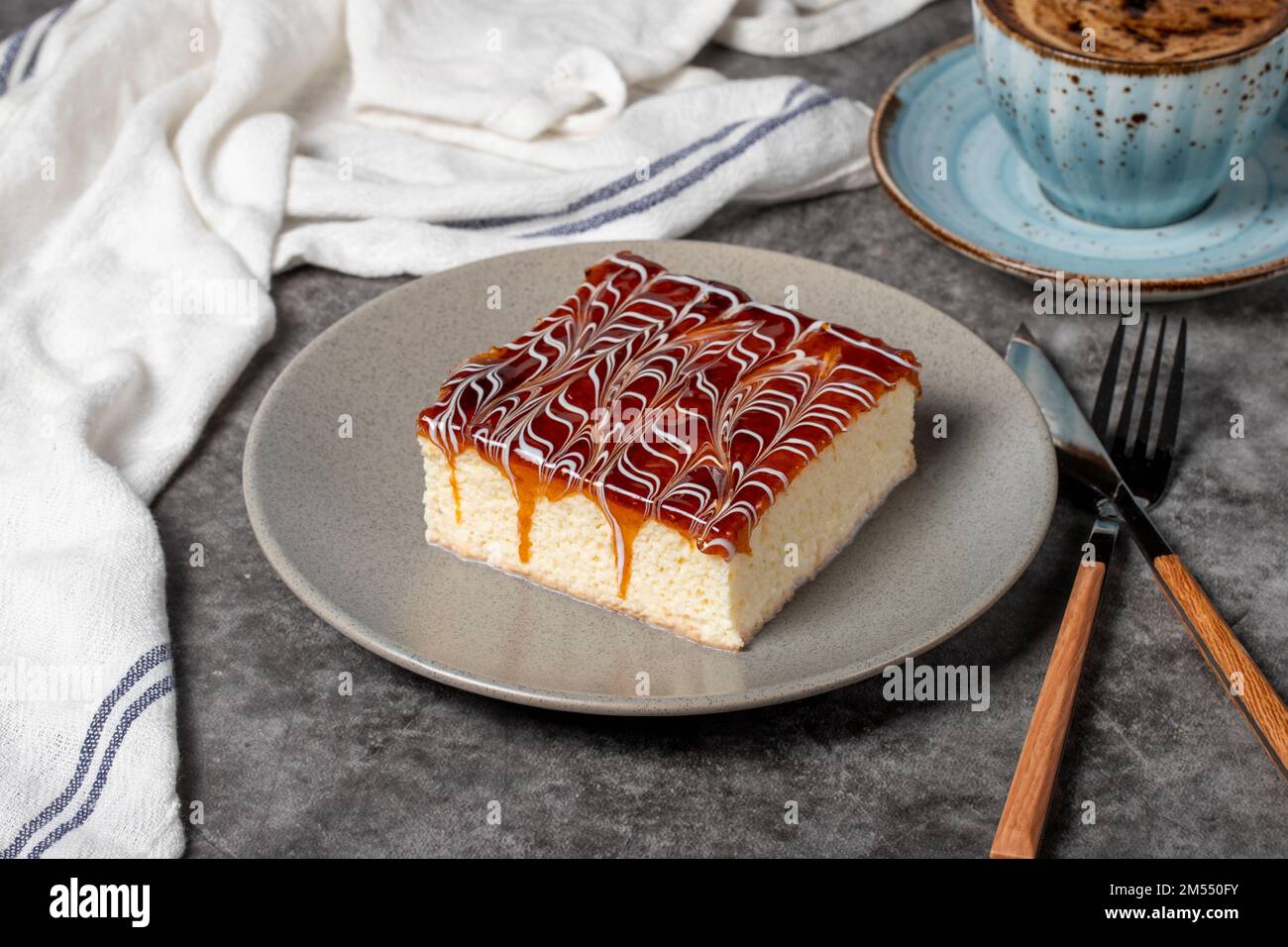 Trilece cake slice on dark background. Milk and caramel cake. Bakery ...