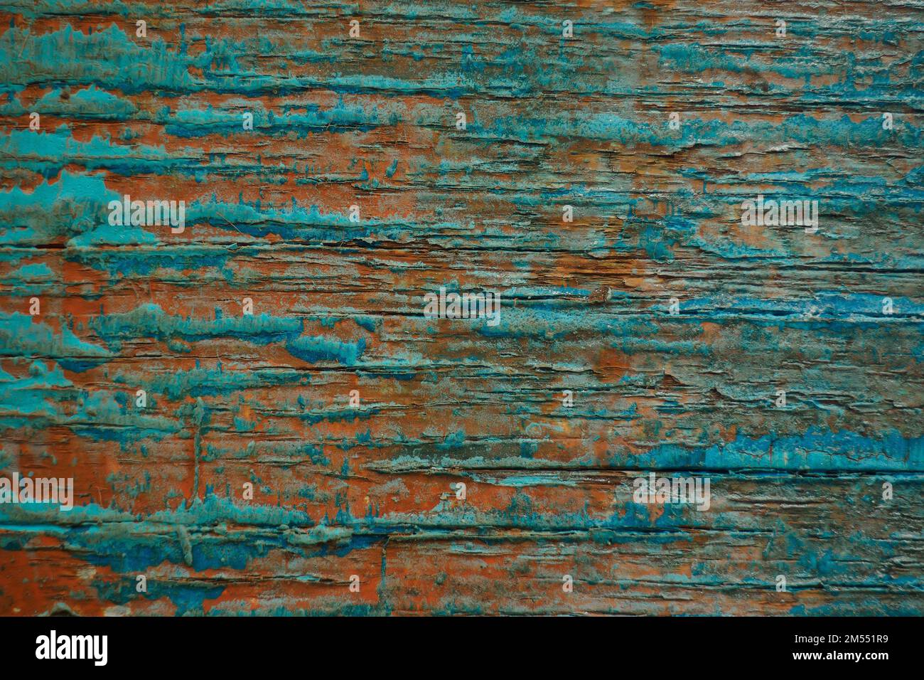 Empty flat wooden surface with strokes of blue paint. Abstract ...