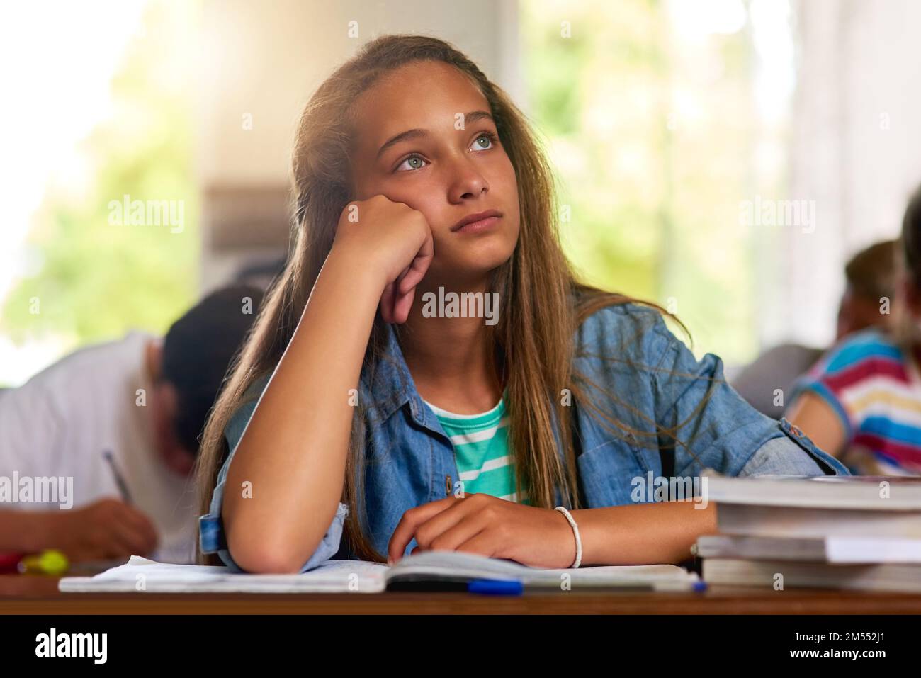 Boy distracted in classroom hi-res stock photography and images - Alamy
